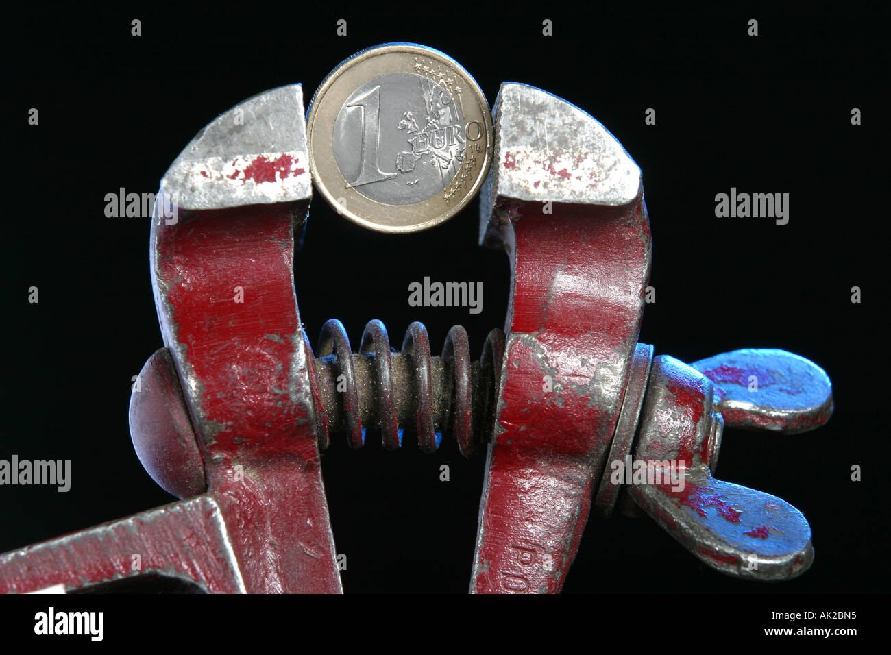 Euro coin in vice hi-res stock photography and images - Alamy