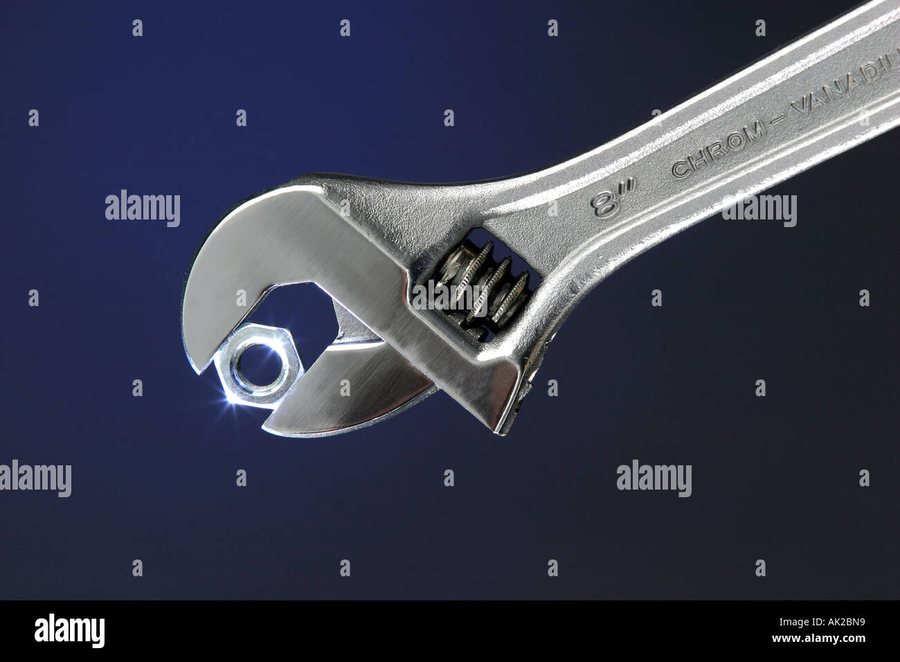 Adjustable wrench with nut Stock Photo - Alamy