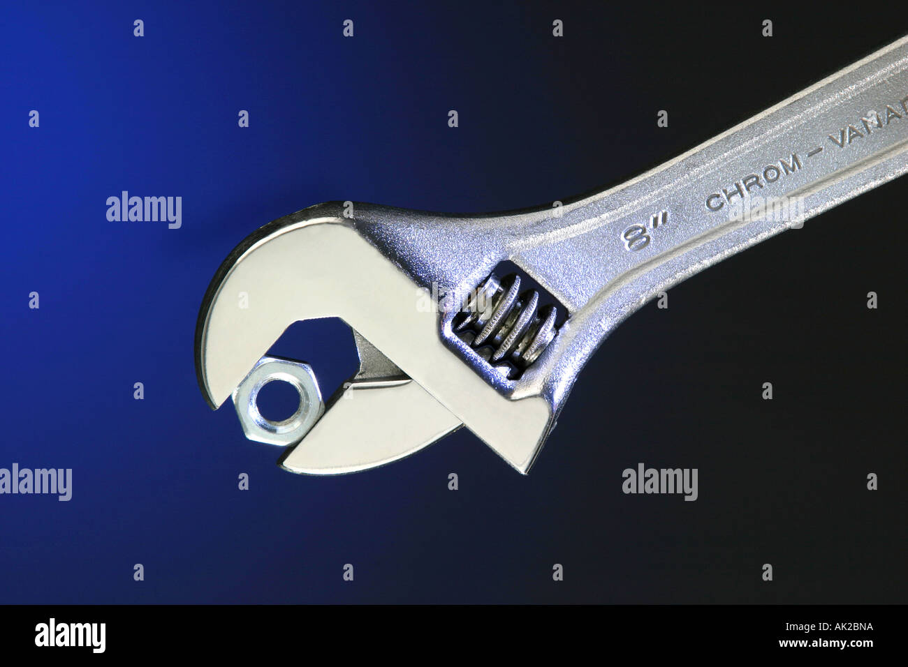 Adjustable wrench with nut Stock Photo - Alamy