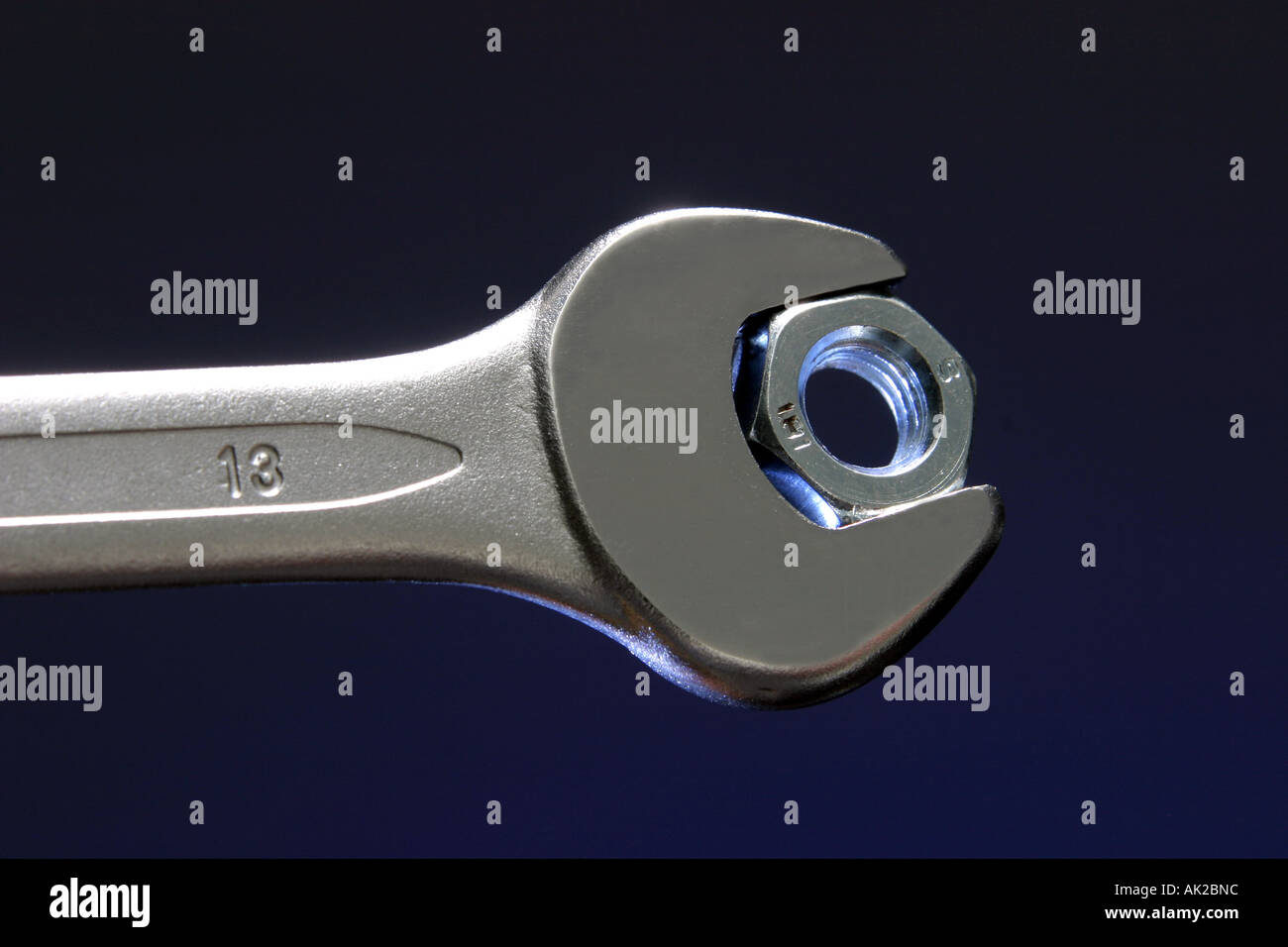 Adjustable wrench with nut Stock Photo - Alamy