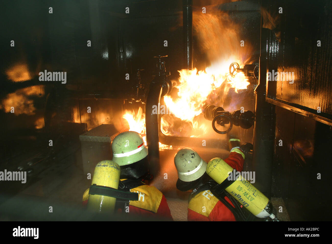 Firebrigade in action Stock Photo - Alamy
