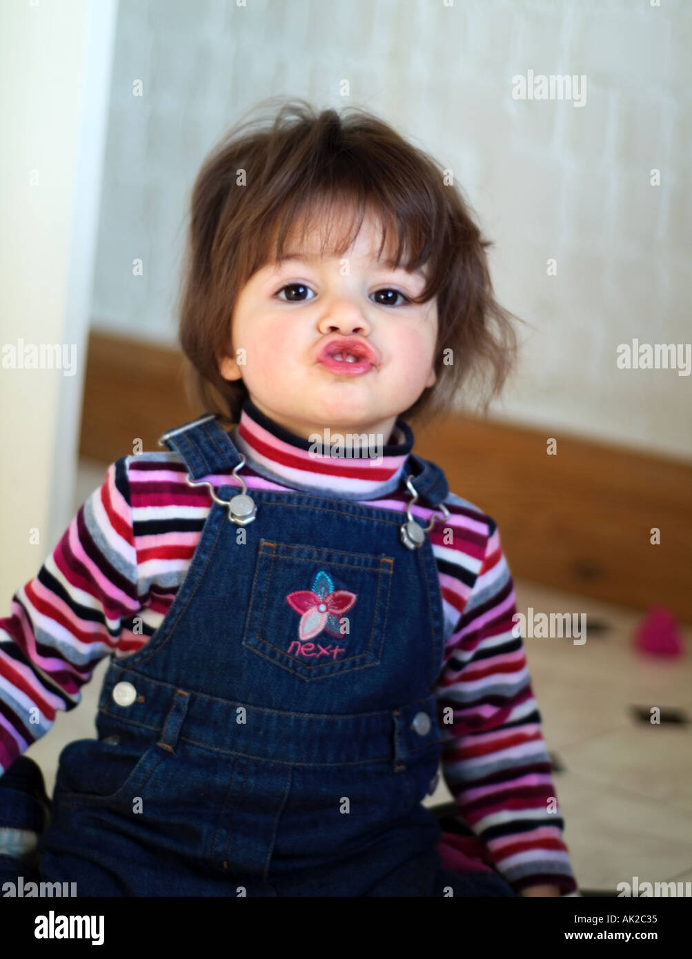little girl pouting her lips Stock Photo - Alamy