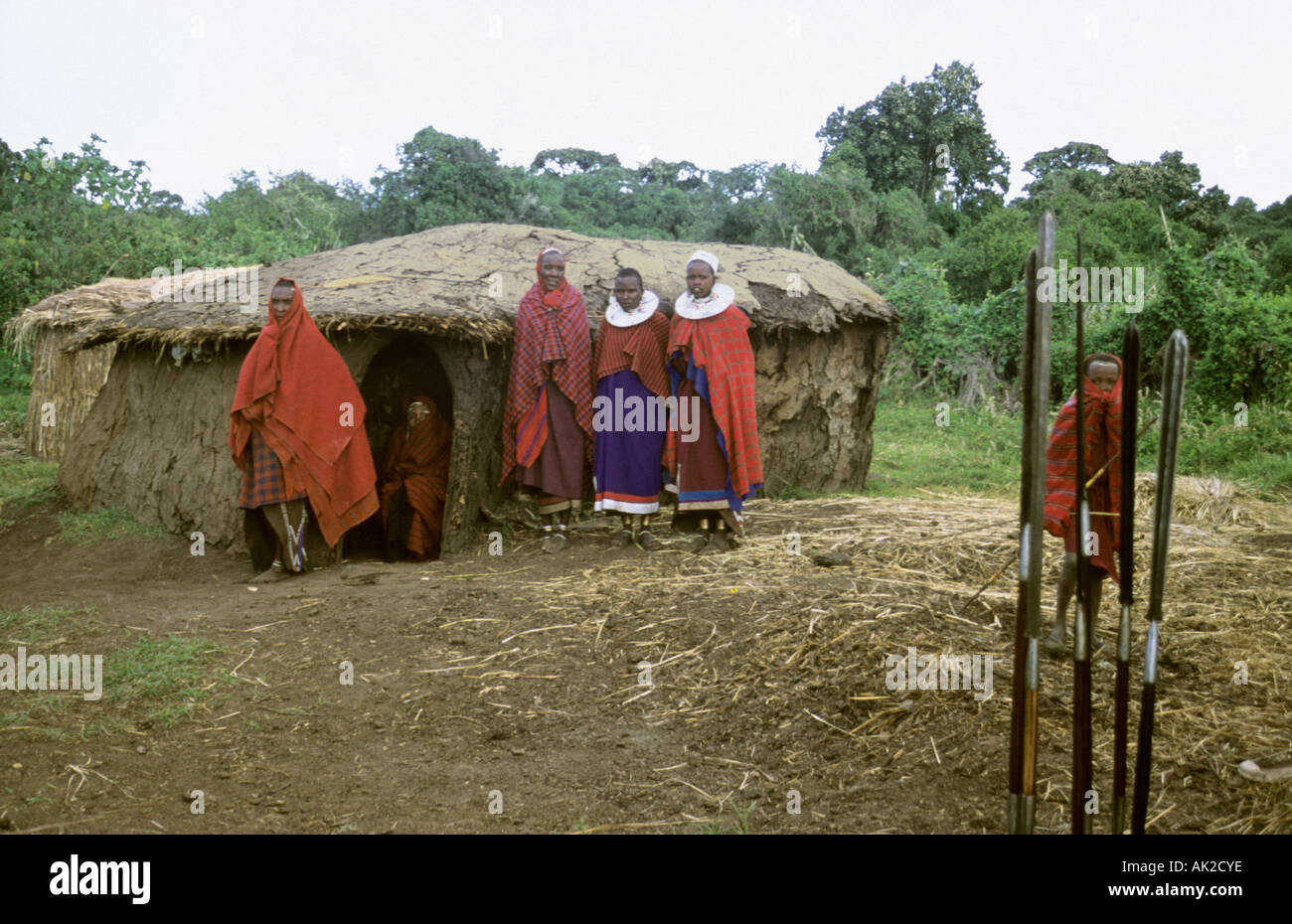 Maasai tribe with their traditional clothes and hut (locally called as ...