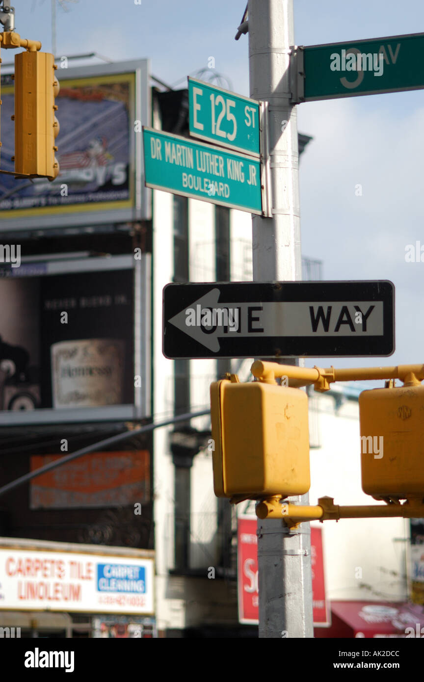 NY Harlem street signs vertical Stock Photo - Alamy