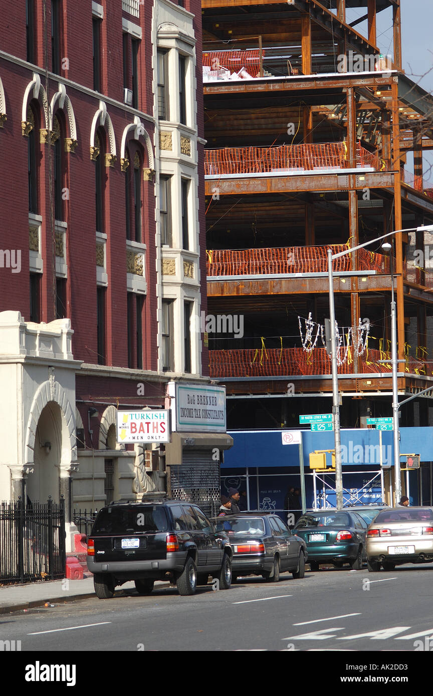 NY Harlem street scene construction building trucks street scene ...