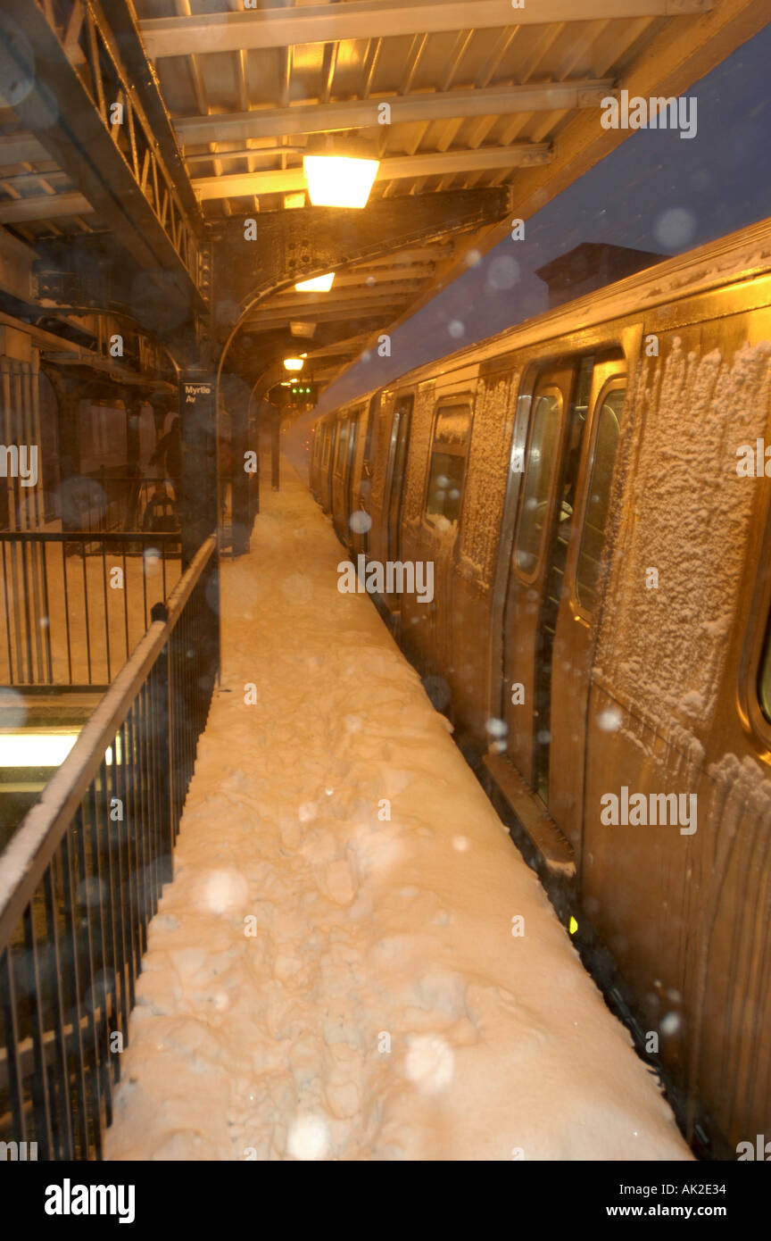 NY subway platform snow vertical Stock Photo - Alamy