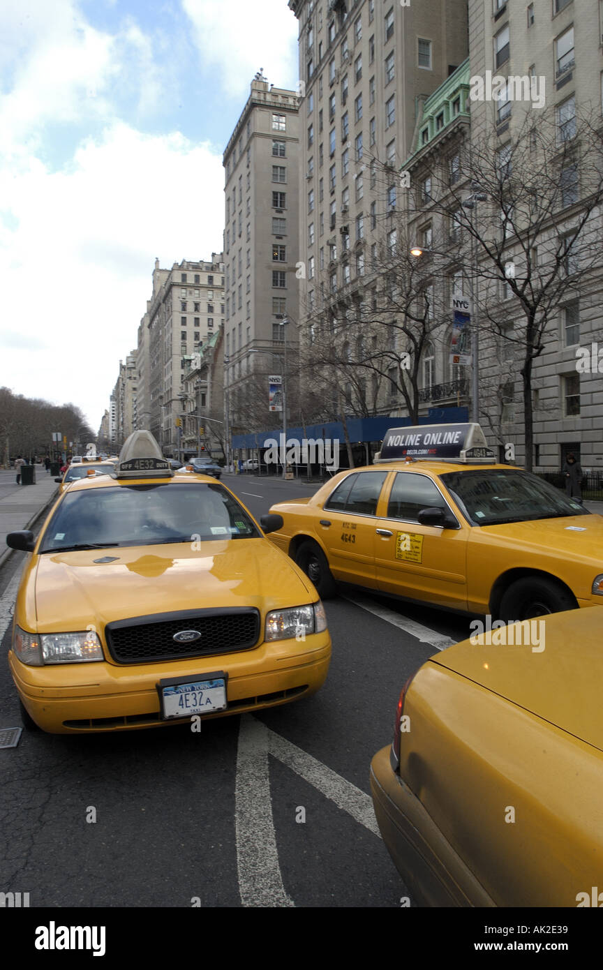 Yellow Cabs NY traffic vertical Stock Photo - Alamy