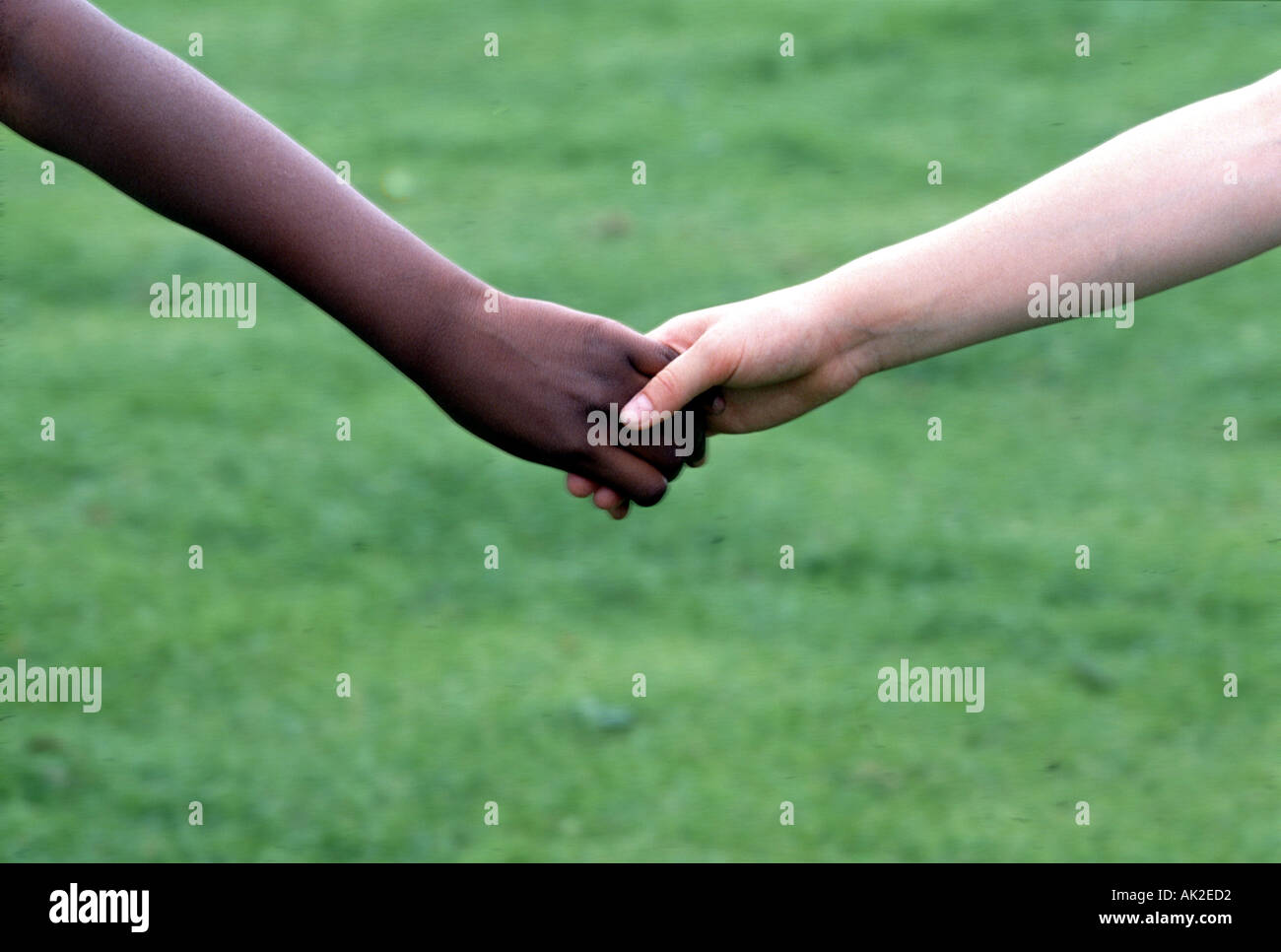 Interlinked hands hi-res stock photography and images - Alamy
