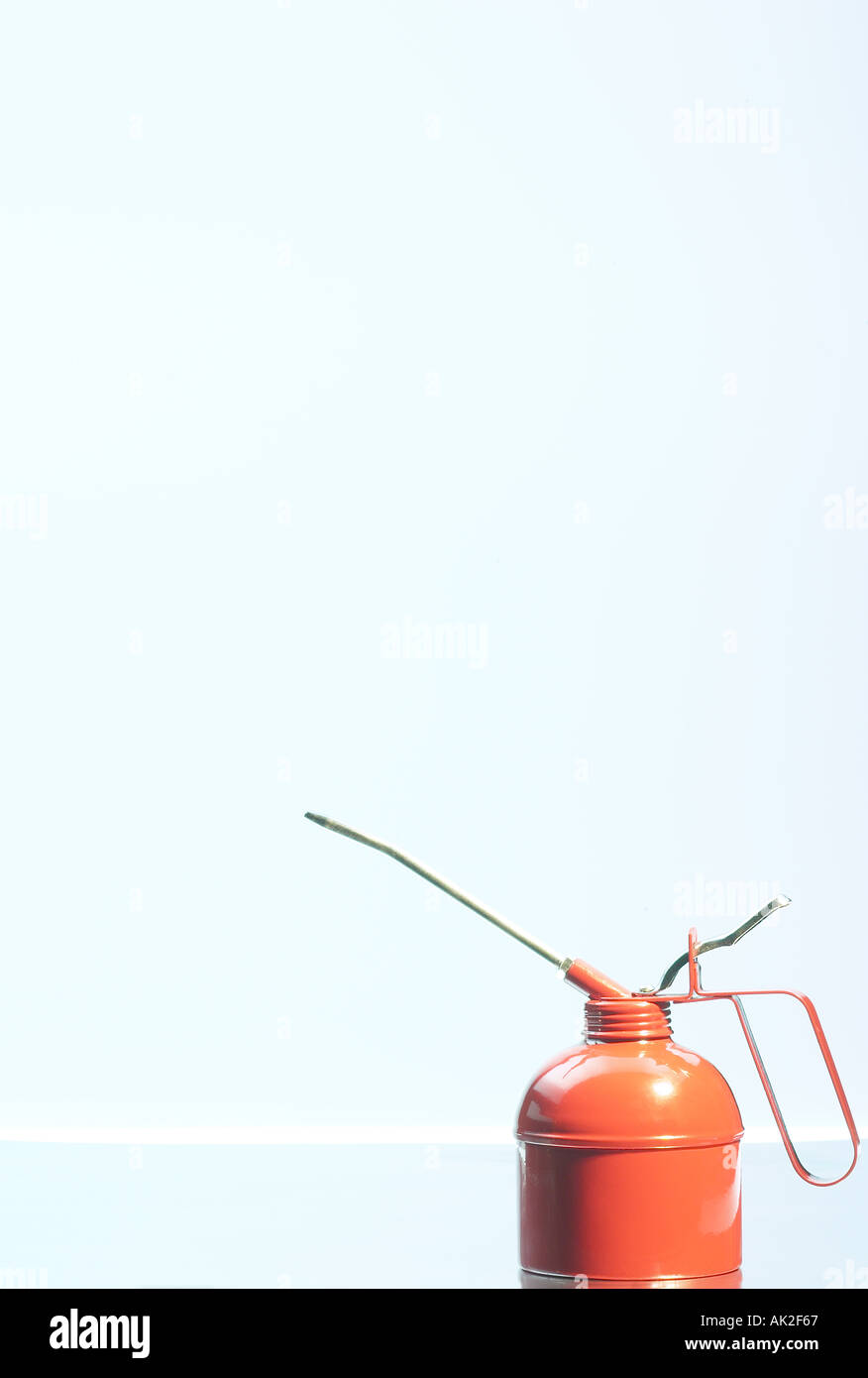 Red metal oil can Stock Photo - Alamy