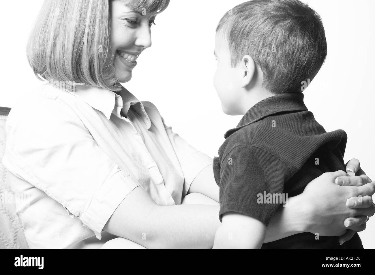 Smiling watching Black and White Stock Photos & Images - Alamy