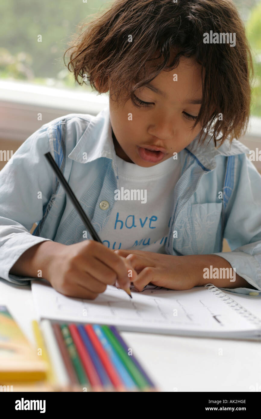 boy learning to write his letters Stock Photo - Alamy