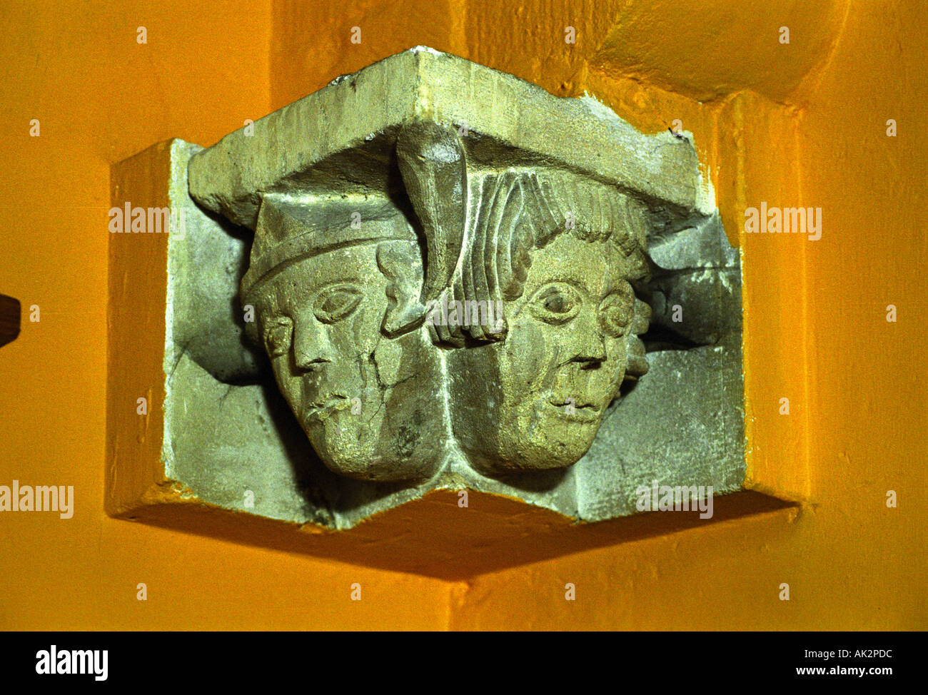 A PAIR OF STONE CARVED FACES IN ST JAMES CHURCH IN EAST CRANMORE ...