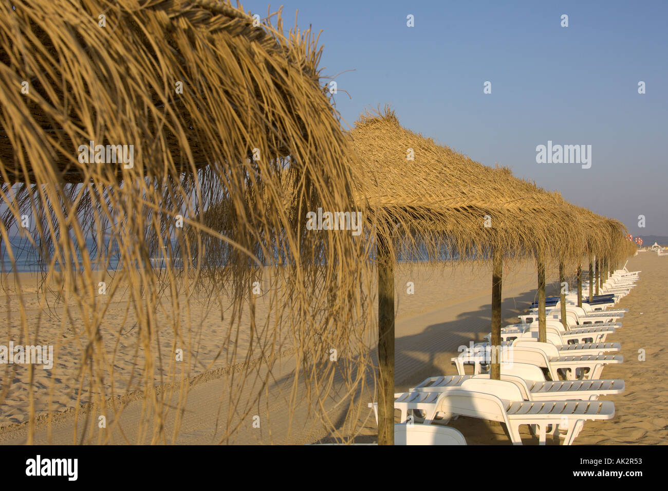 straw beach umbrella Stock Photo - Alamy