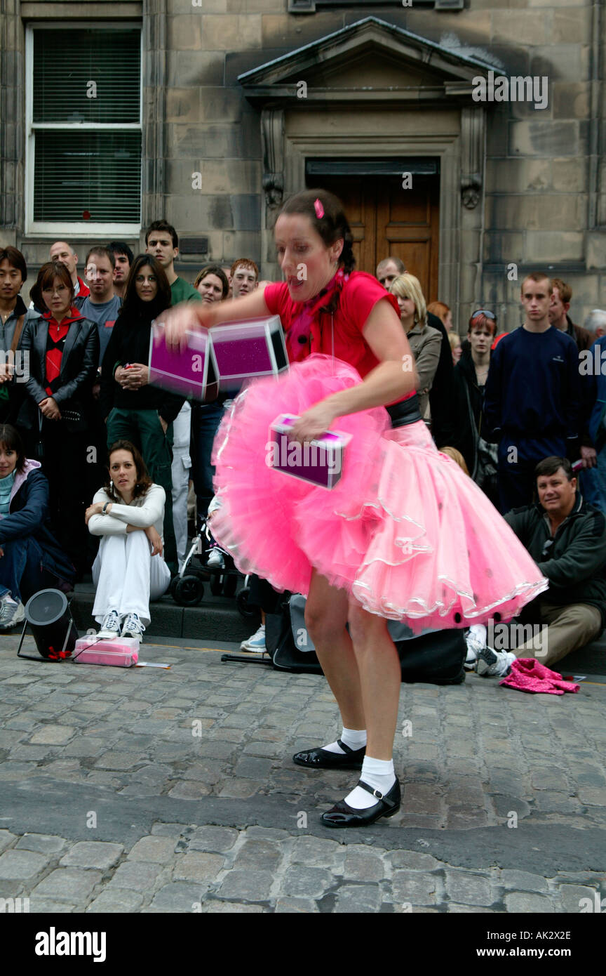 Female Street Performer entertaining audience during Edinburgh Fringe ...