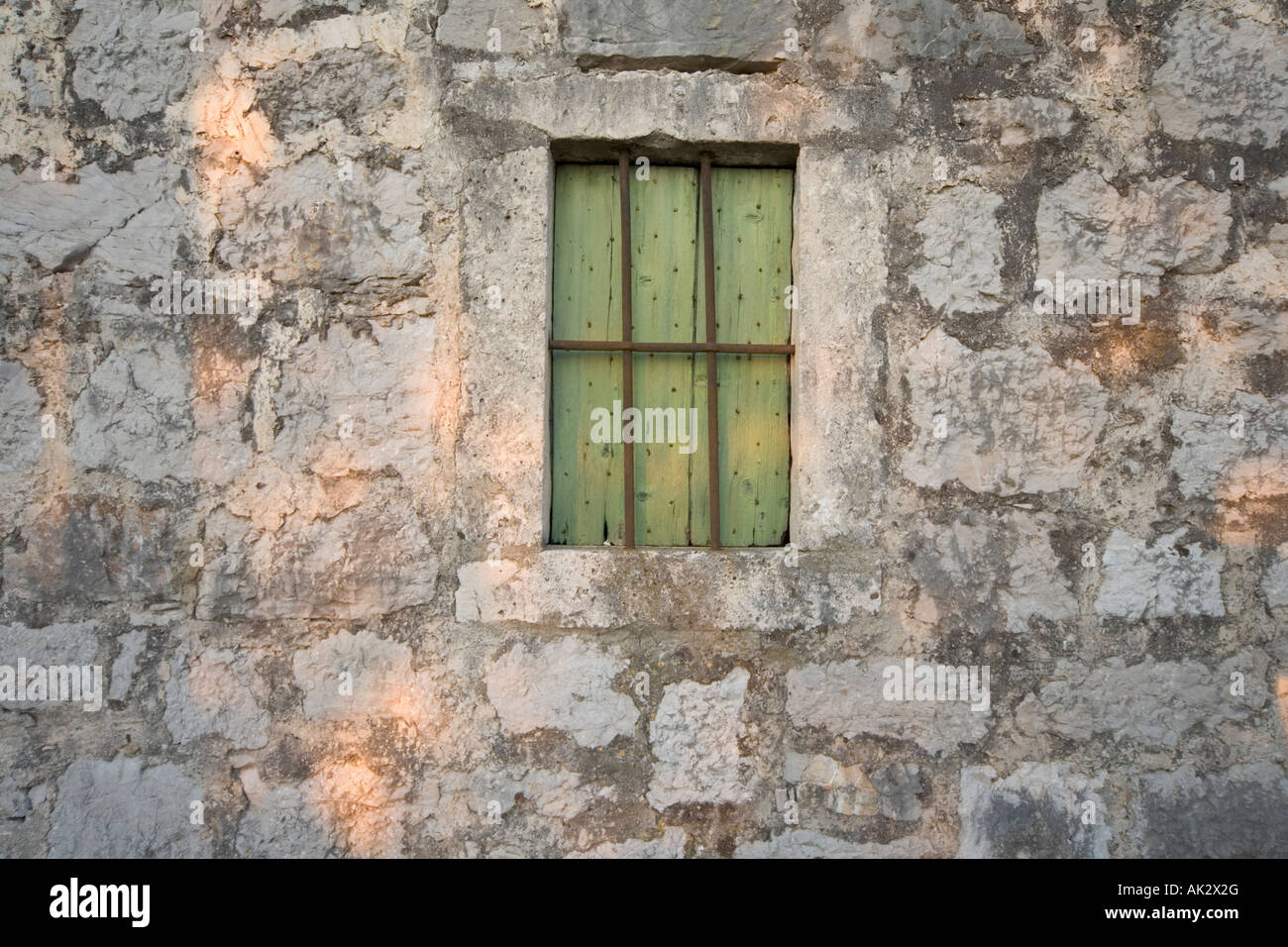 Detail of barred window in wall of ancient village of Pitve Hvar ...