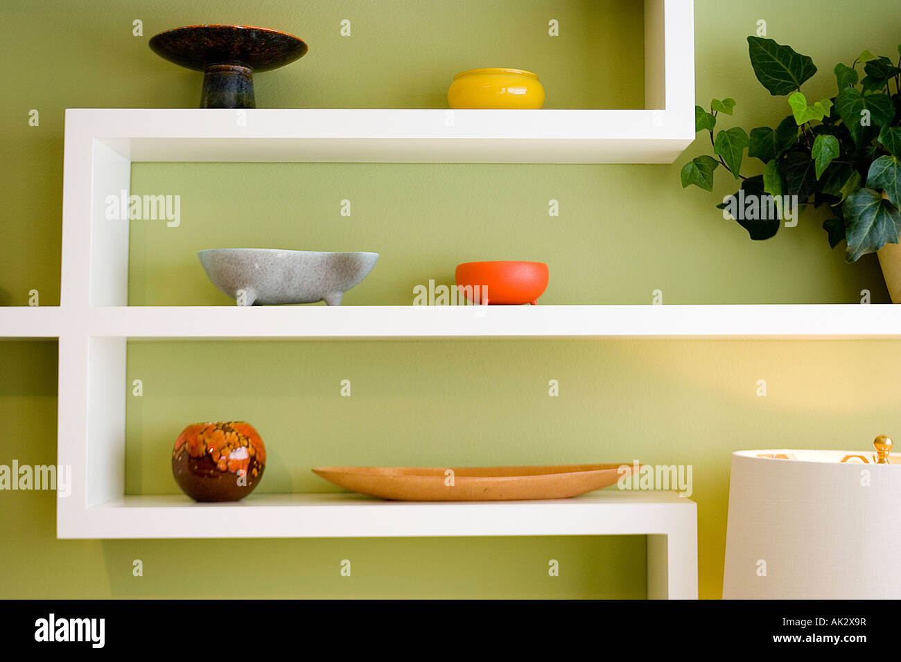 Contemporary Display Shelf with Colorful Pottery Stock Photo - Alamy