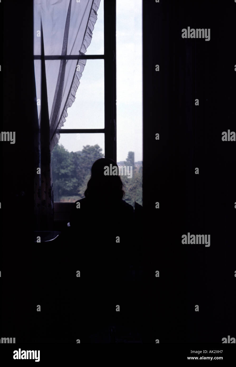 woman silhouette in front of a window Stock Photo - Alamy