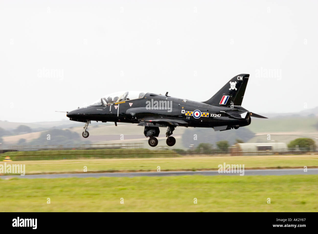 Black liveried RAF Hawk jet trainer XX247 taking off Stock Photo - Alamy