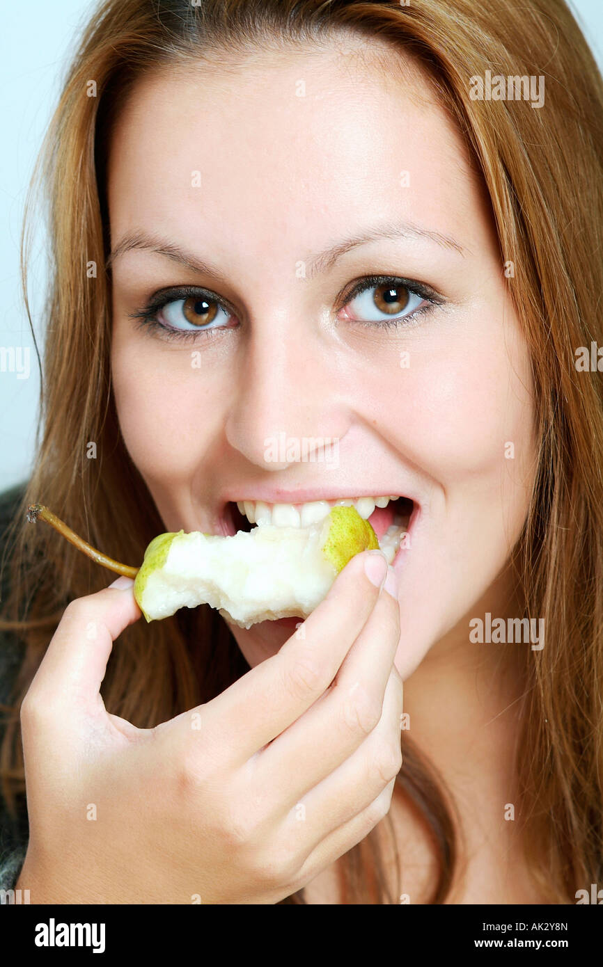 Biting a pear hi-res stock photography and images - Alamy