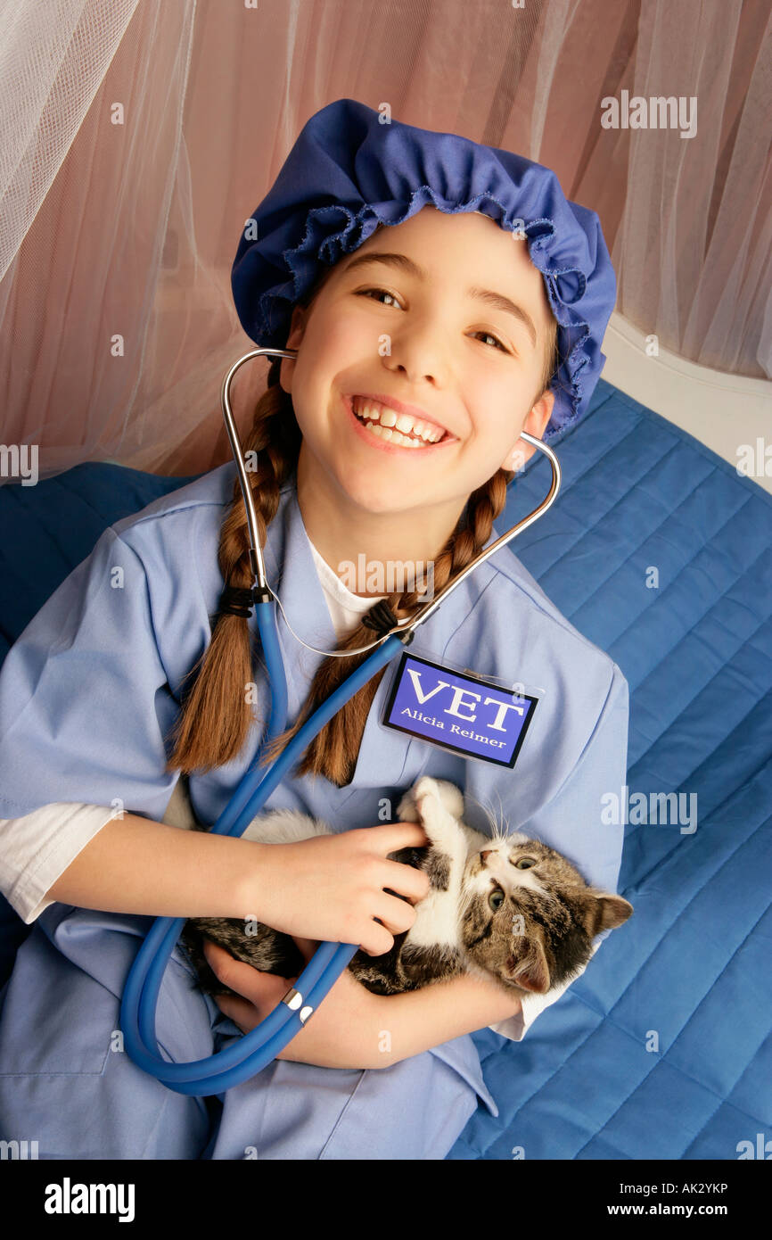 Girl play with cats hi-res stock photography and images - Alamy