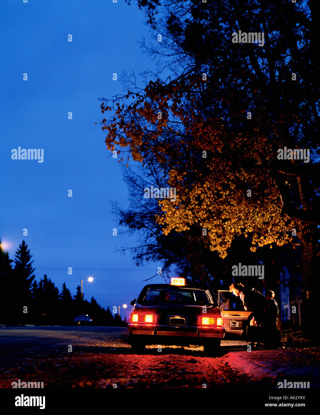 A taxi at night Stock Photo - Alamy