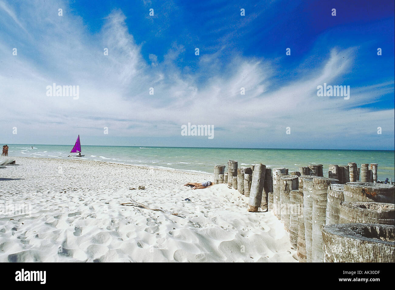 Beach with sailboat in distance Progresso Yucatan Mexico Stock Photo ...
