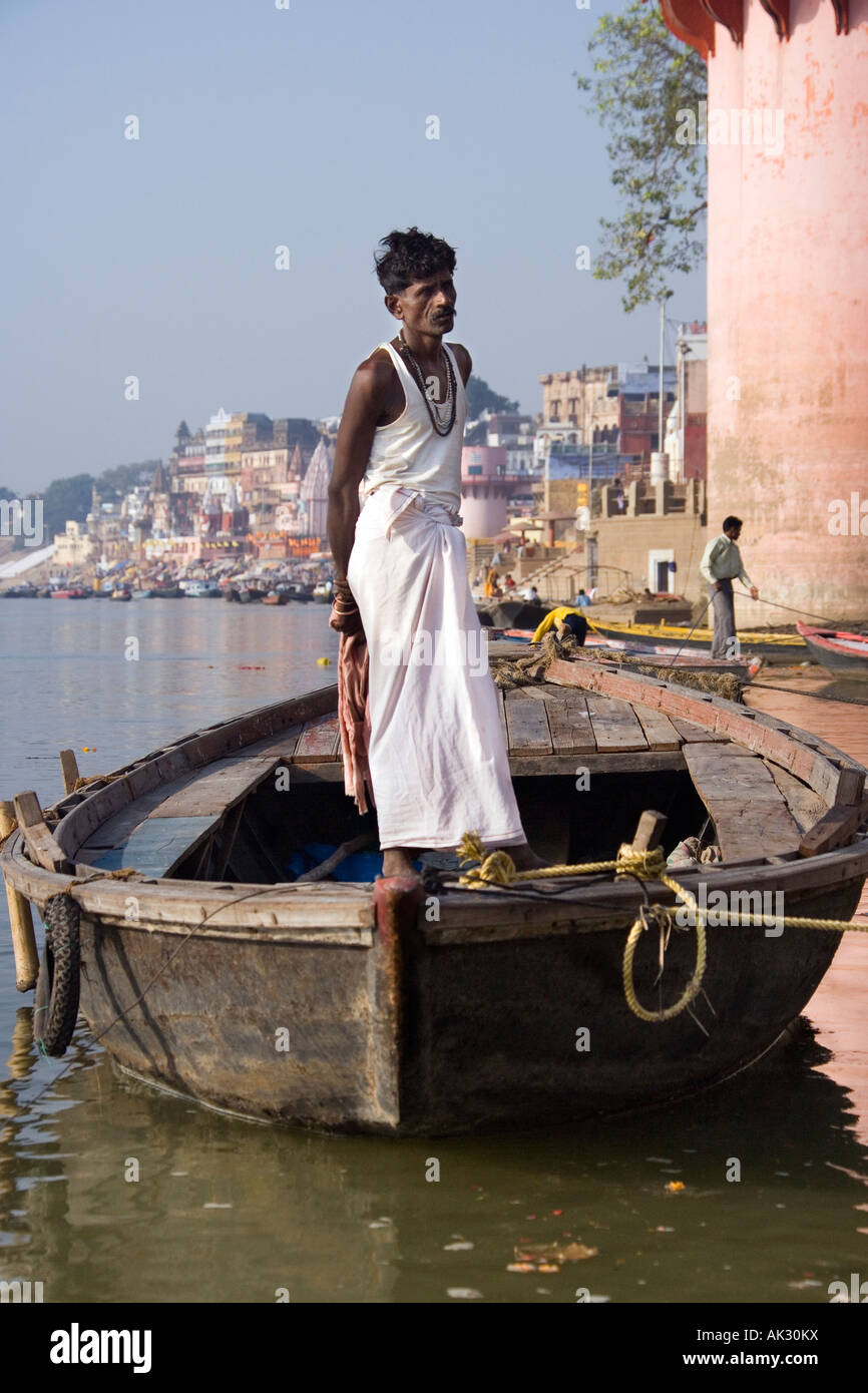 Indian man boatman rowing boat hi-res stock photography and images - Alamy