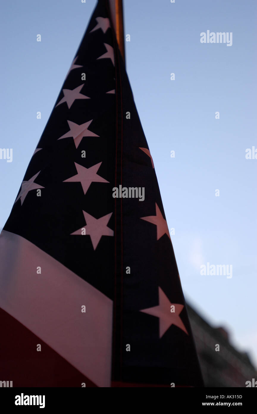 NY United States Flag flying exterior partial vertical Stock Photo - Alamy