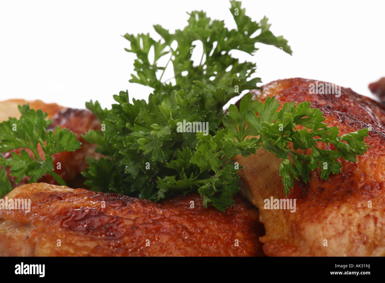 Roasted chicken meat on a plate nobody overhead from above on white ...