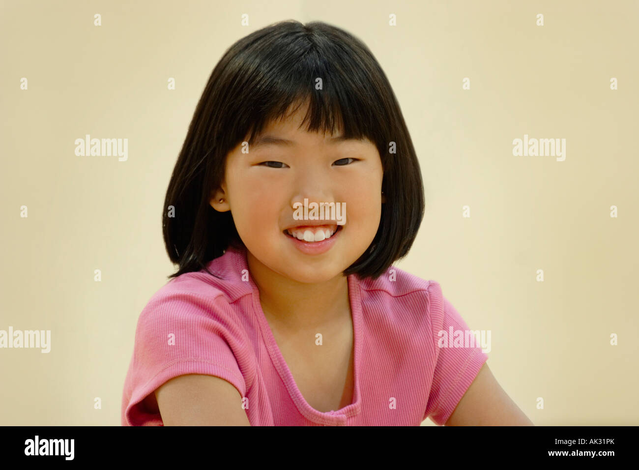 Smiling asian girl Stock Photo - Alamy