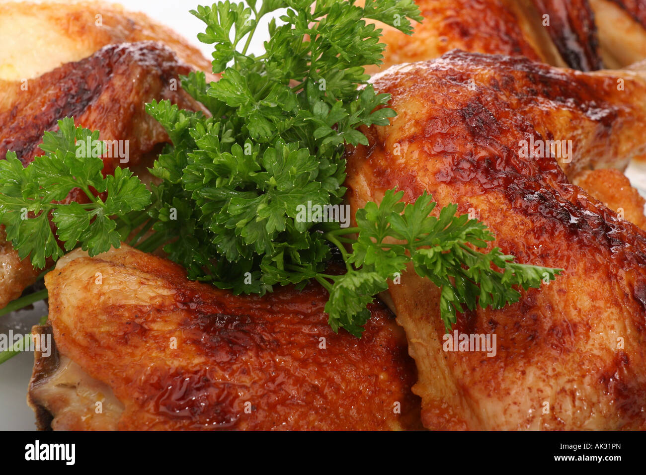 Roasted chicken meat on a plate table nobody overhead horizontal ...