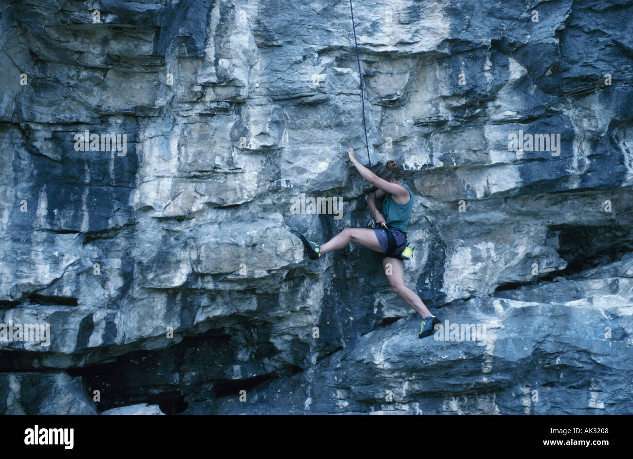 Woman rock climbing Quebec Canada Stock Photo - Alamy