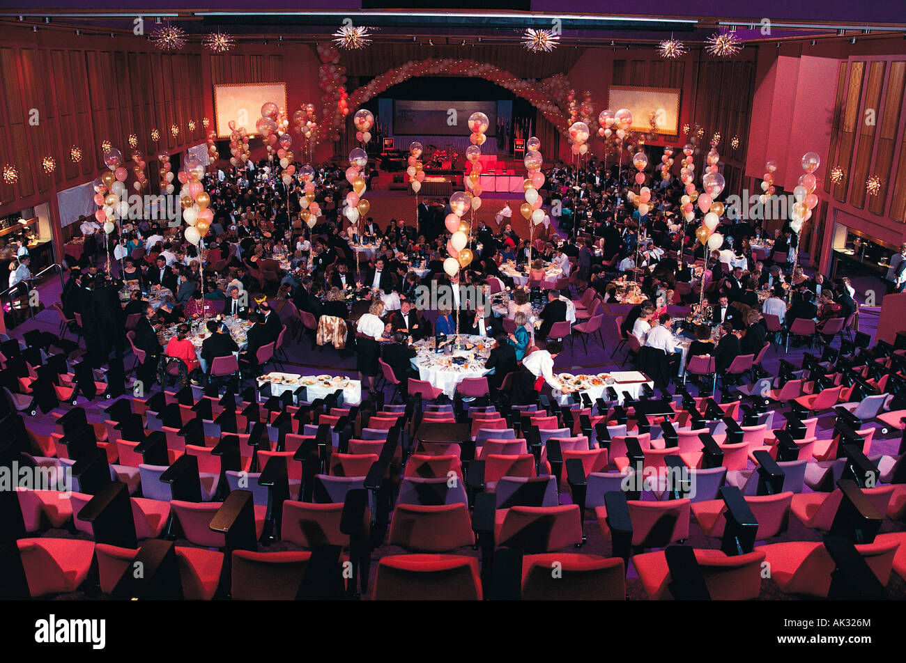 Crowd of people at dinner in conference center theater Stock Photo - Alamy