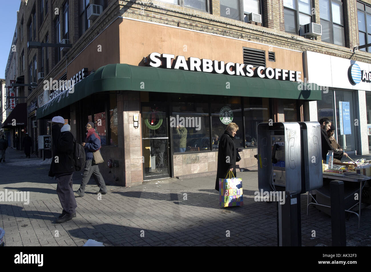 NY Harlem street storefronts shops horizontal Stock Photo - Alamy