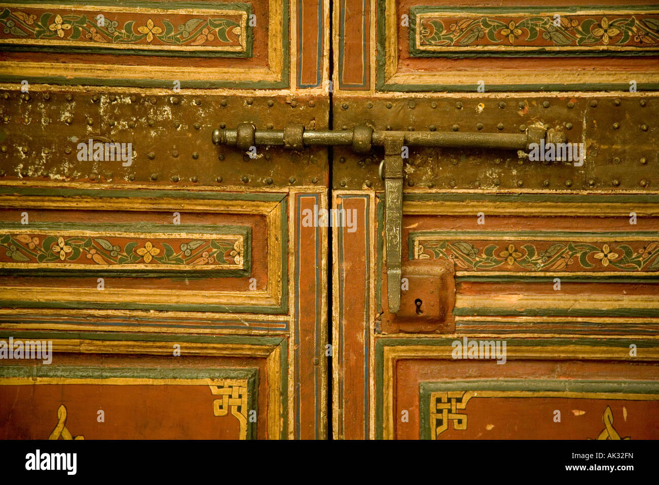 Ornate lock on a door leading to the courtyard of Musee de Marrakesh ...