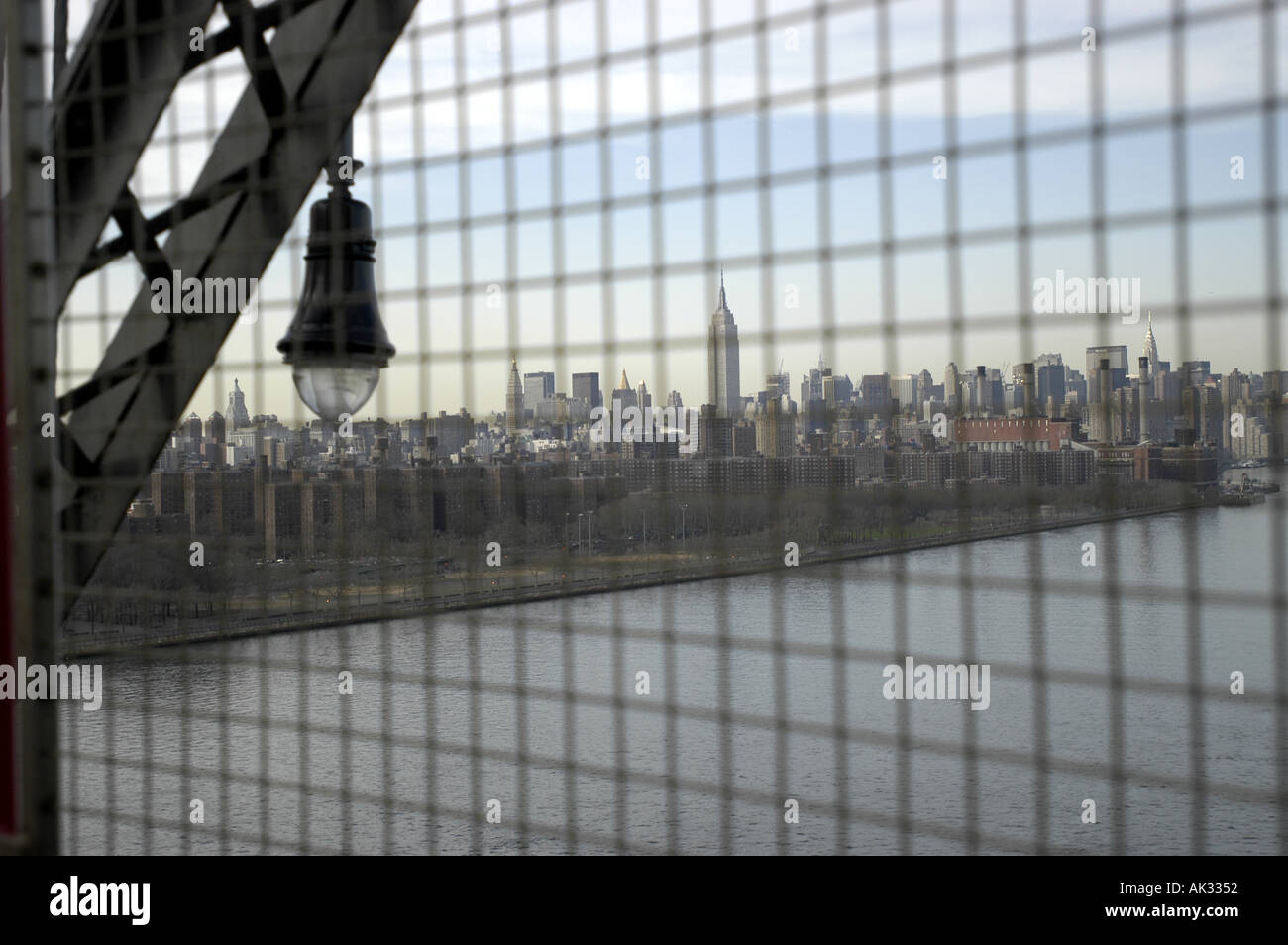 NY Cityscape wire view cage girders bridge horizontal Stock Photo - Alamy