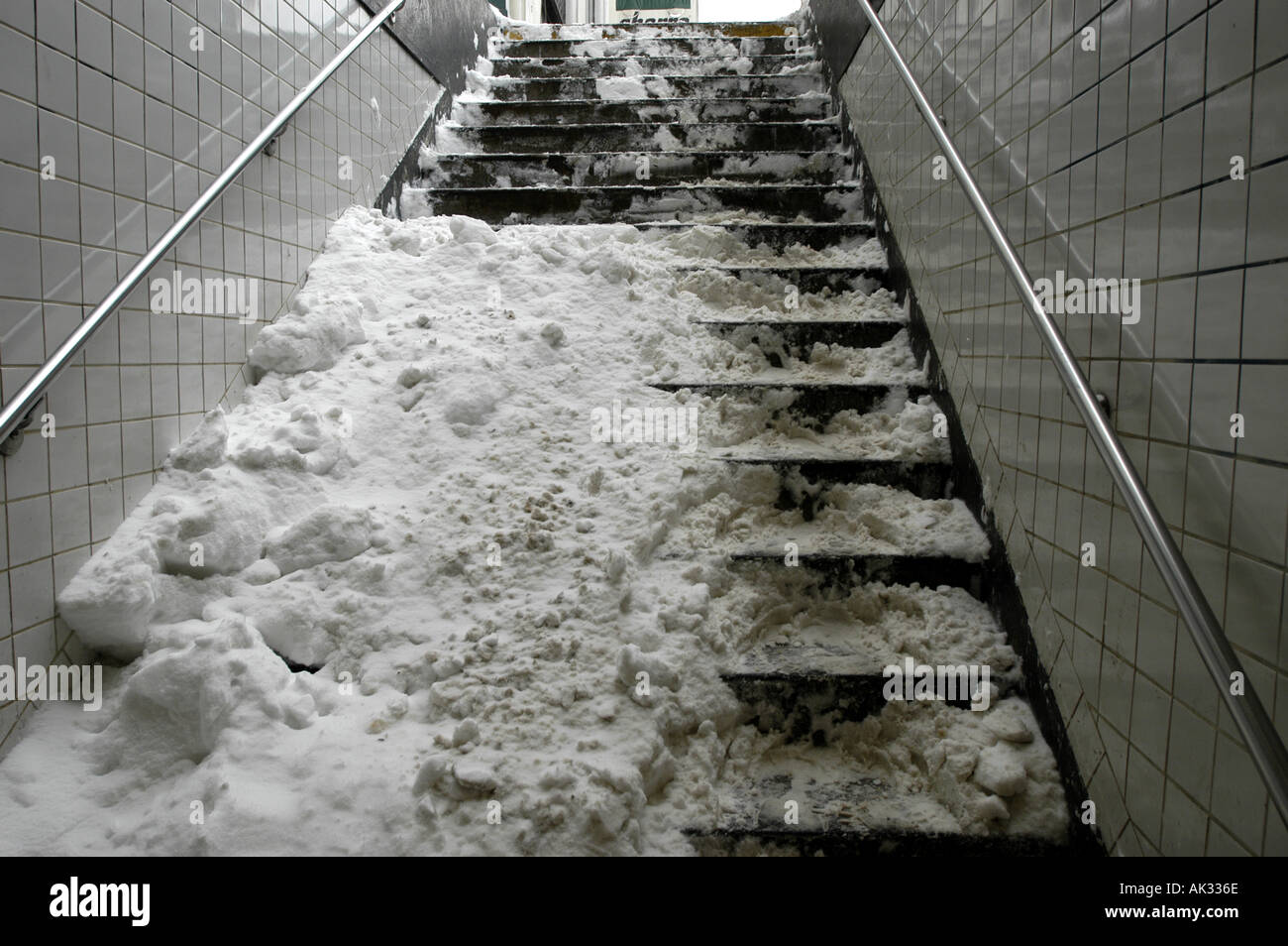 NY snow Union Square Manhattan Subway steps vertical Stock Photo - Alamy