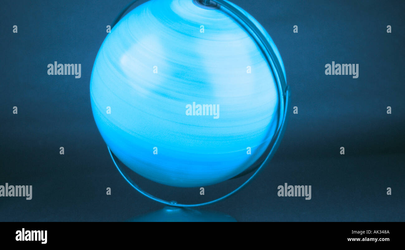 Spinning blue globe Stock Photo - Alamy