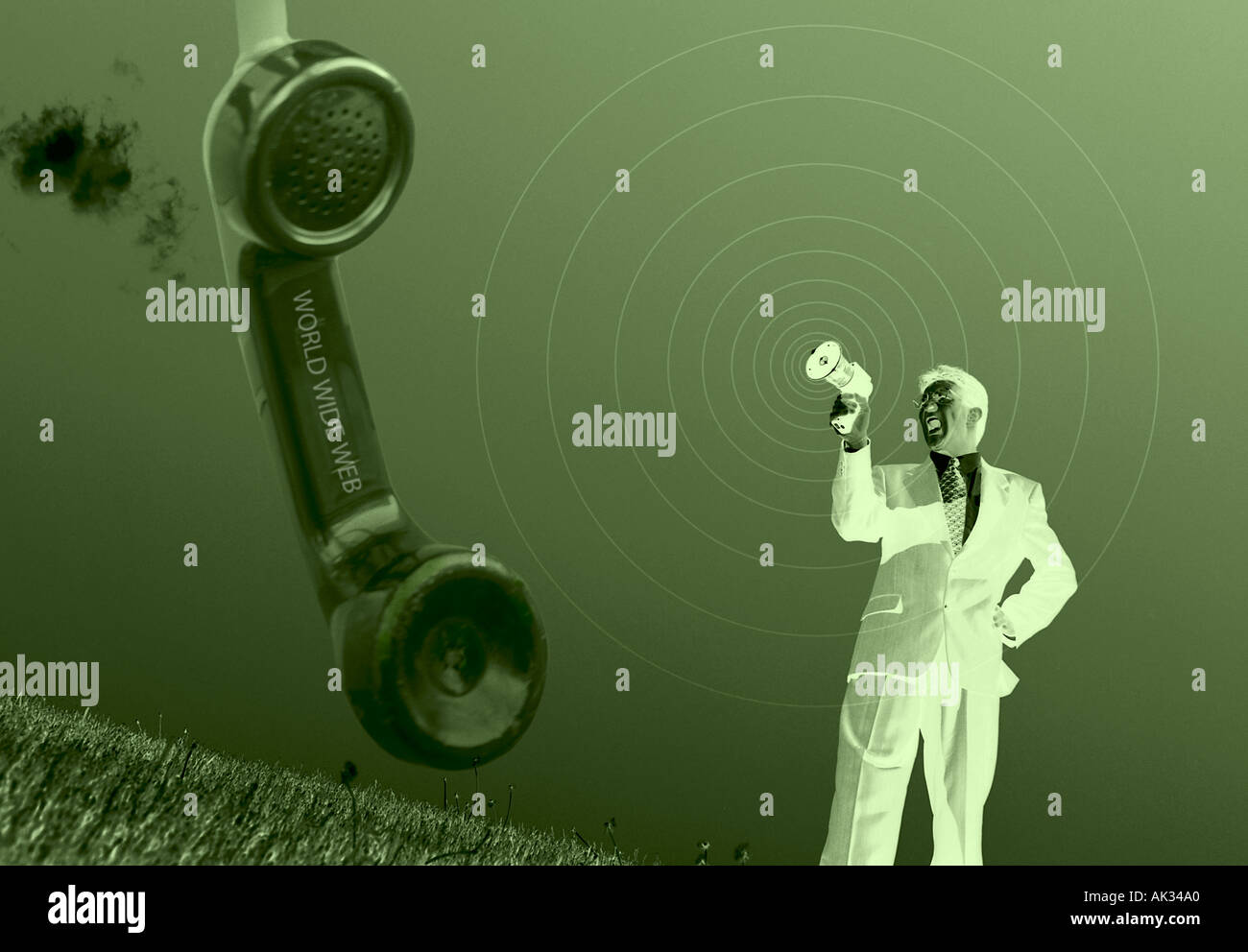 Man with giant phone receiver Stock Photo - Alamy