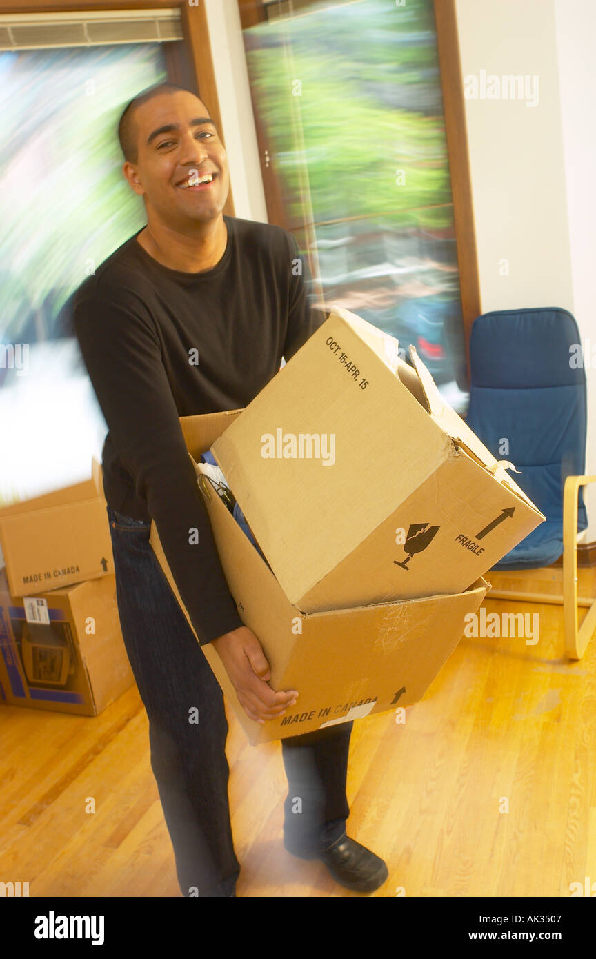 Man carrying weight hi-res stock photography and images - Alamy
