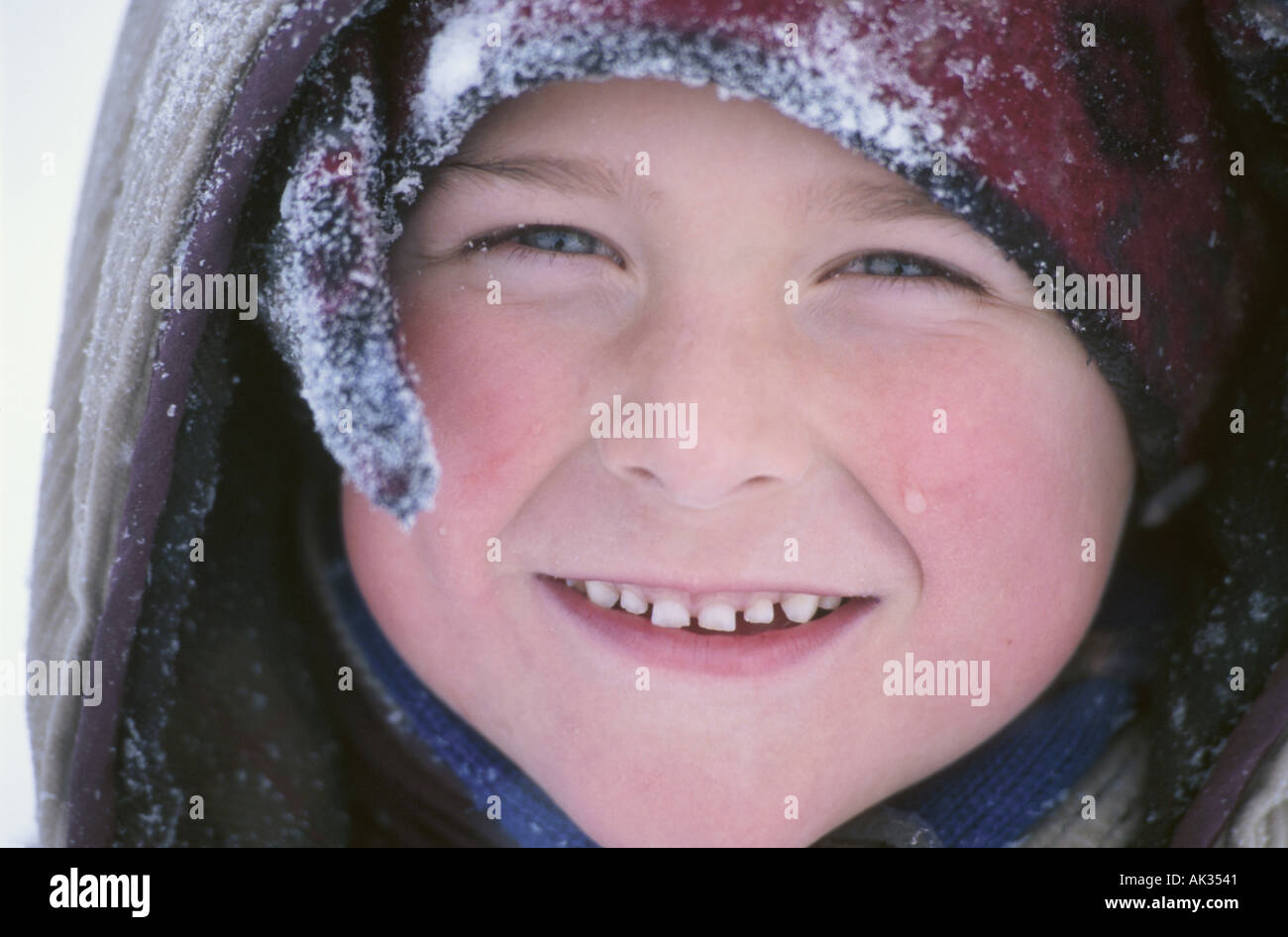 Boy in snow 0001 Stock Photo - Alamy