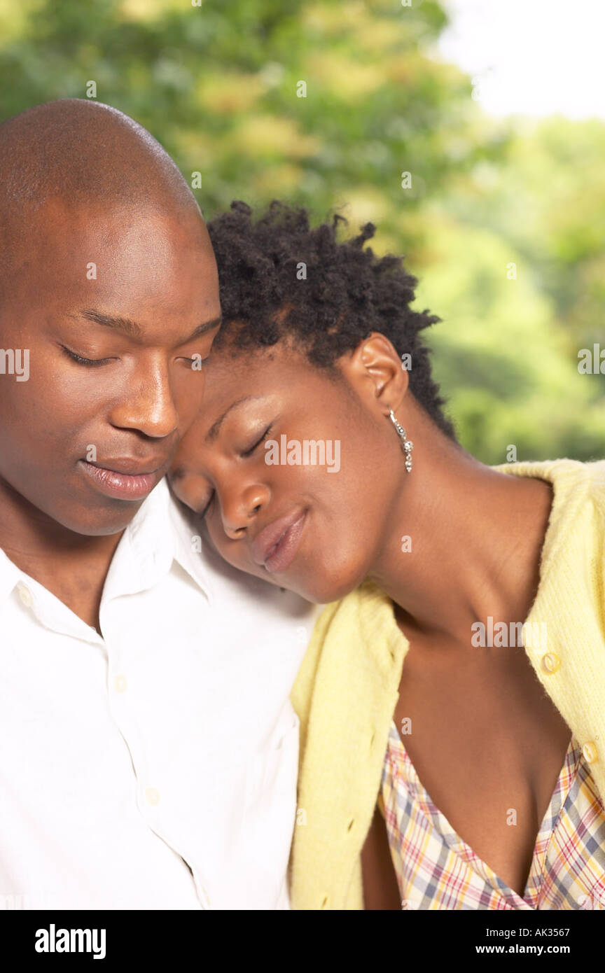Woman resting her head on man s shoulder 3 Stock Photo - Alamy