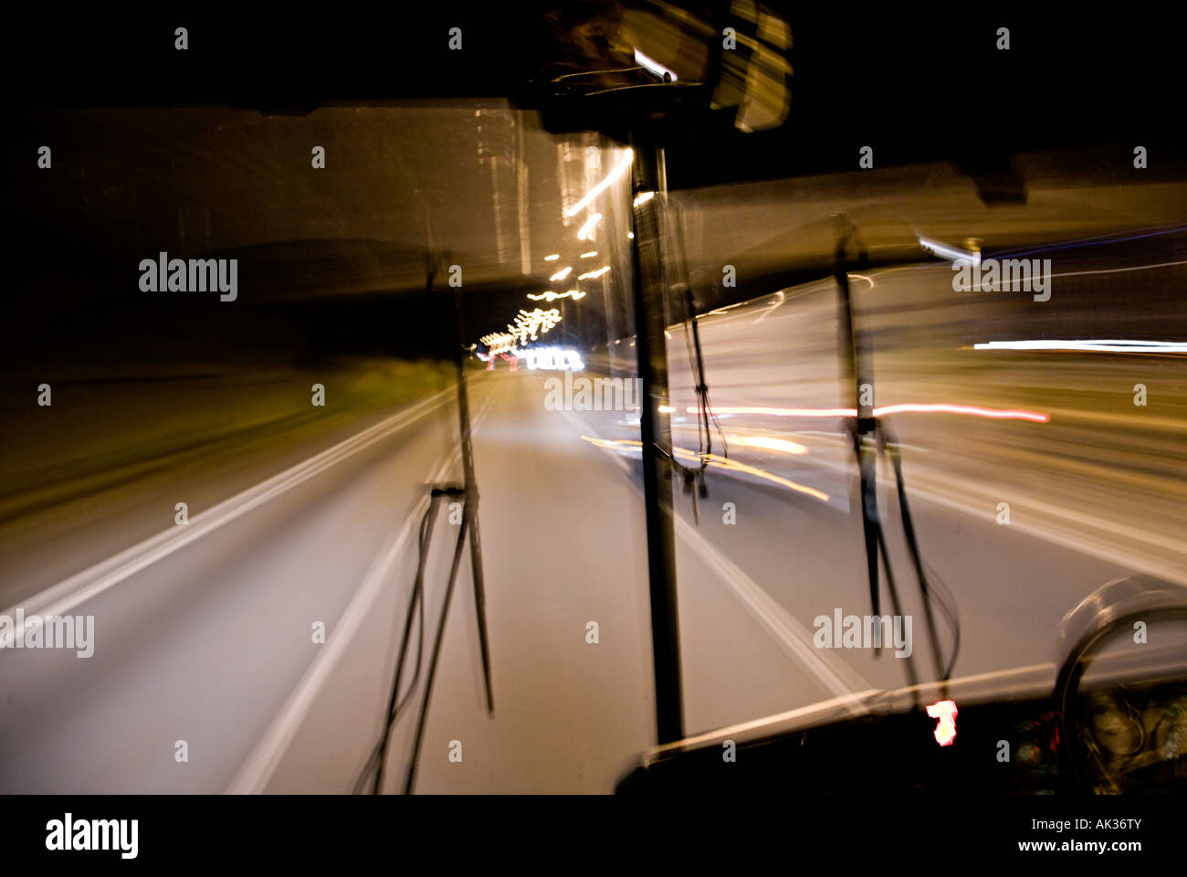 a view through the front of a coach on the m1 motorway traveling home ...