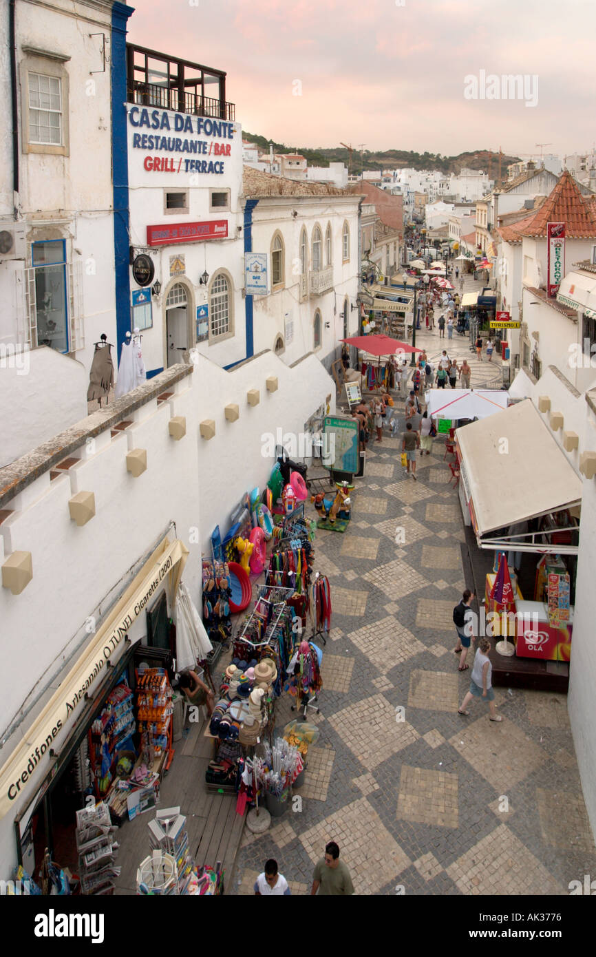 Shops in the resort centre in the early evening, Albufeira, Algarve ...