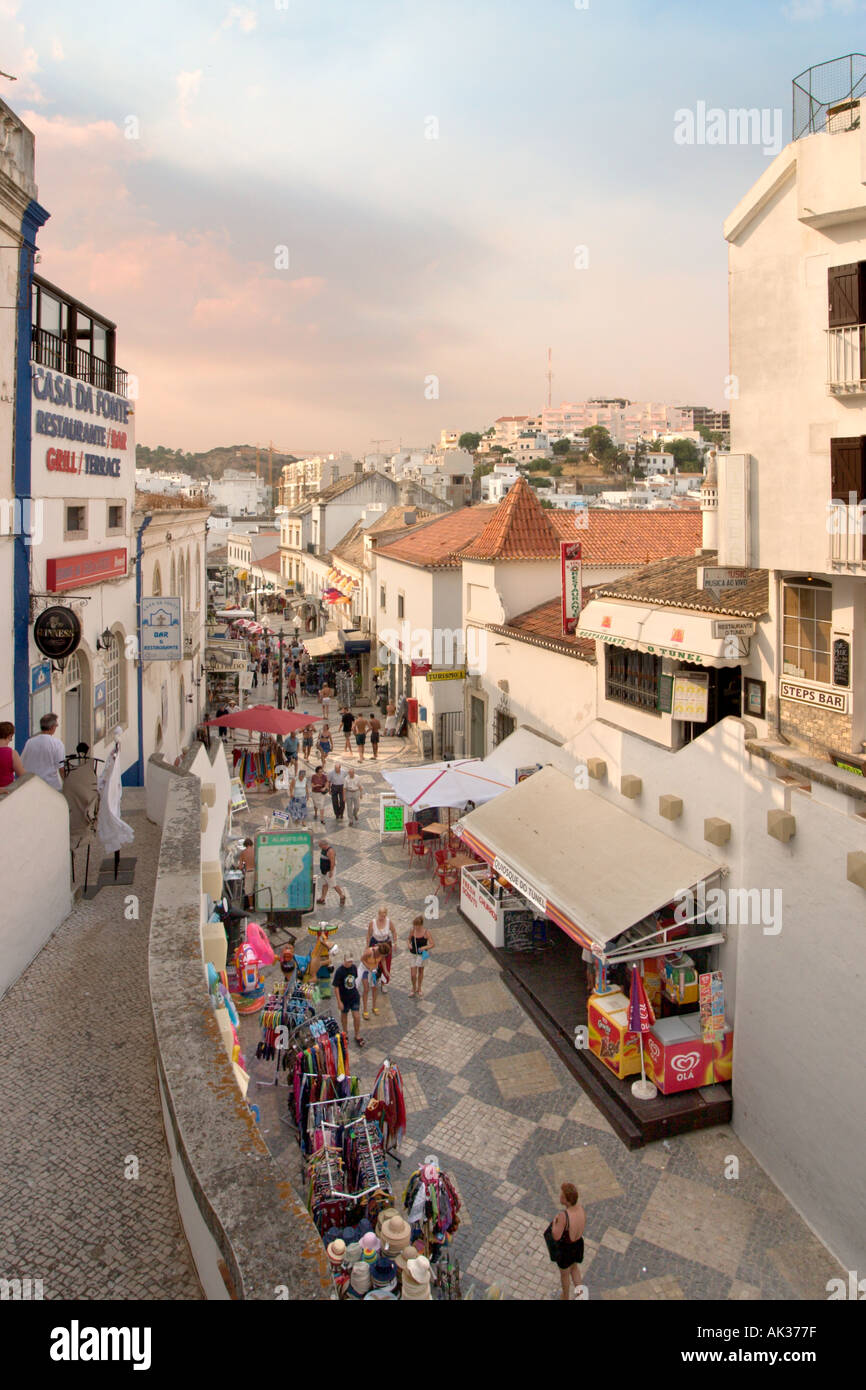 Shops in the resort centre in the early evening, Albufeira, Algarve ...