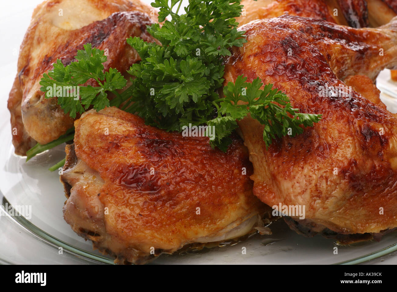 Roasted chicken meat on a plate nobody overhead from above closeup on ...