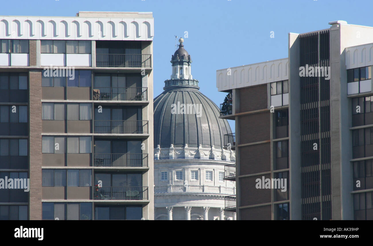 Dome of Utah State capitol viewed through office buildings of Salt Lake ...