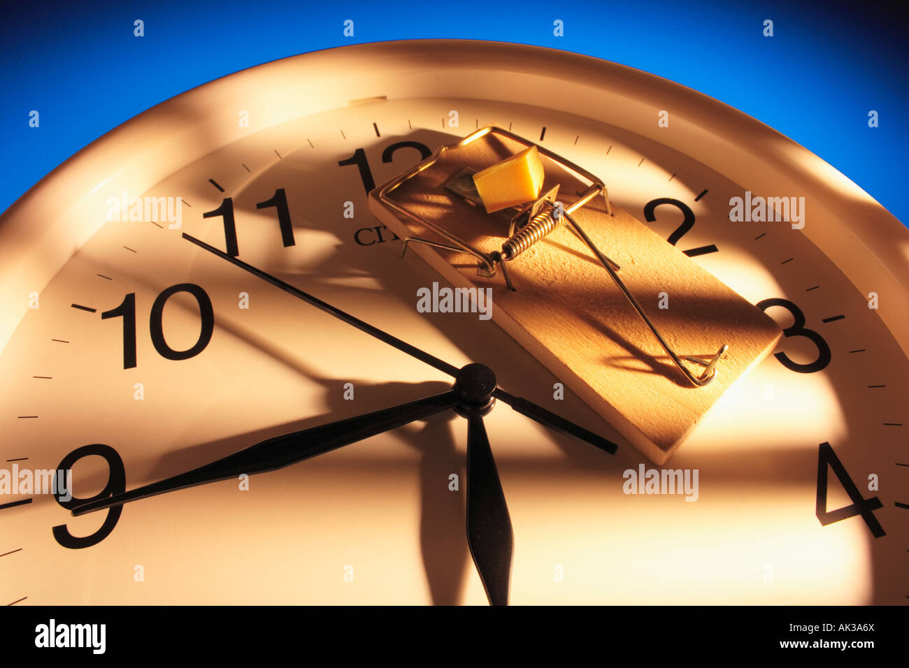 Mouse Trap on Clock Stock Photo - Alamy