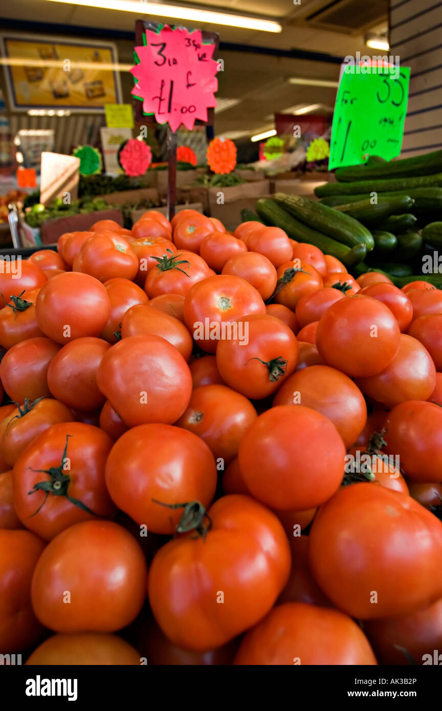 red tomatoes in a grocery shop on soho rd in birmingham Stock Photo - Alamy
