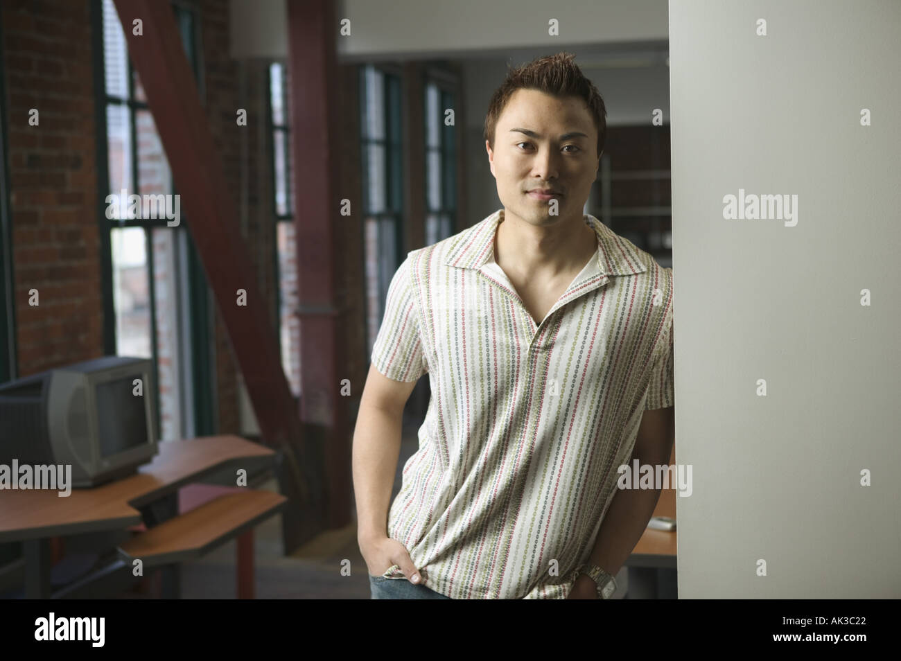 Man leaning against doorway hi-res stock photography and images - Alamy